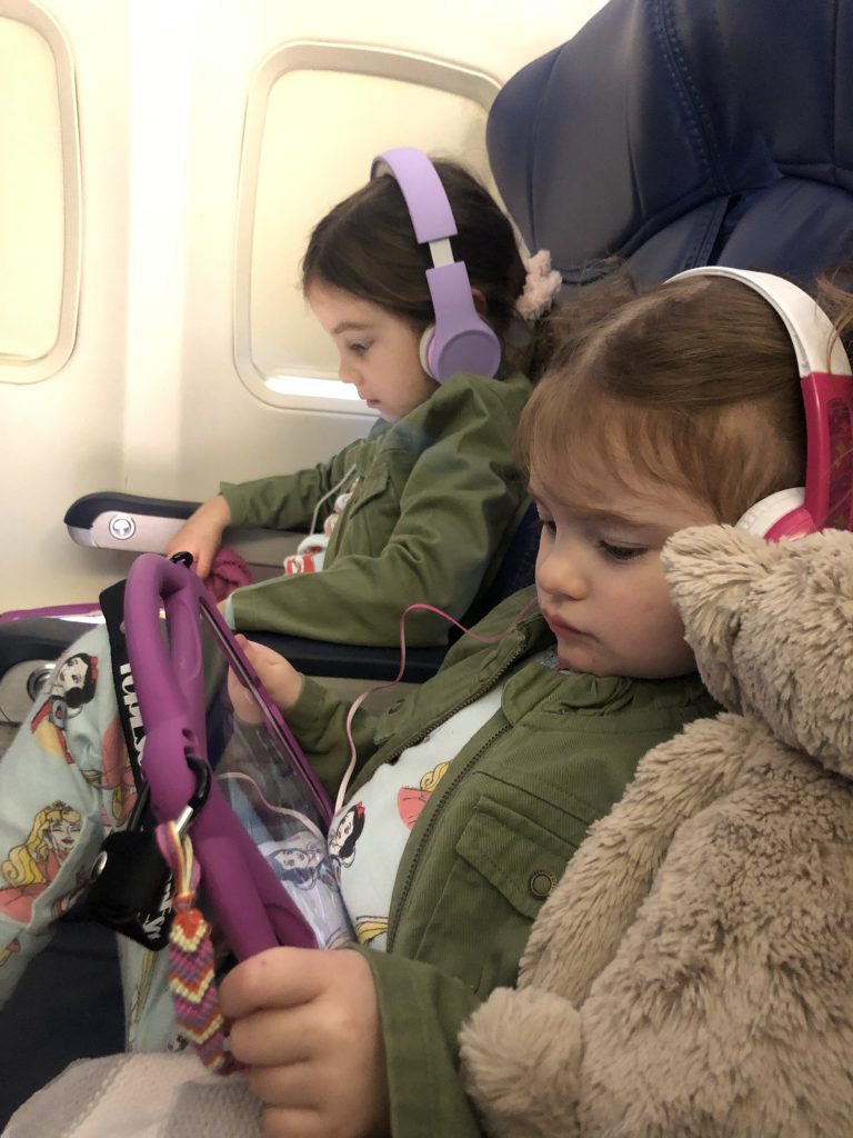 Easy Tips for Flying Alone with Toddlers - Caitlin Houston